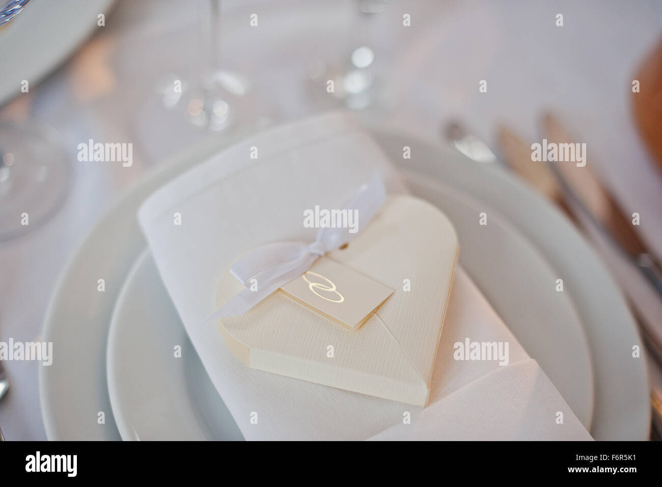 decorated heart at wedding table Stock Photo - Alamy