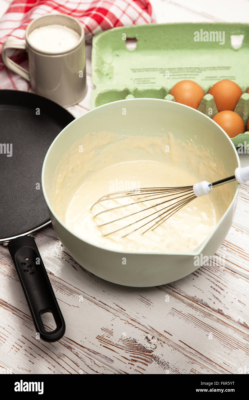 Preparing batter for pancakes Stock Photo - Alamy