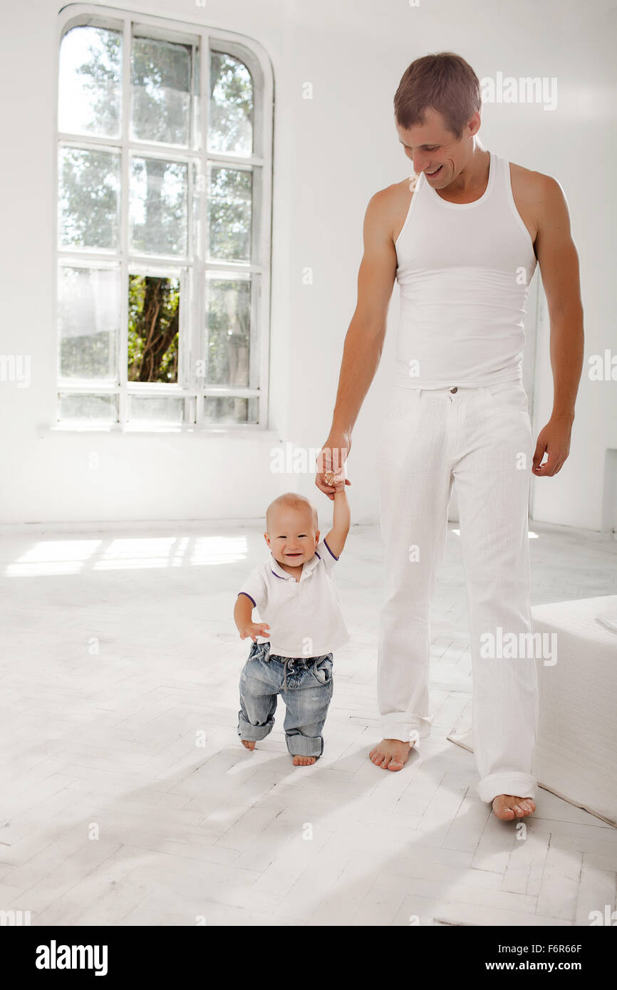 young father with his nine months old son at home Stock Photo - Alamy