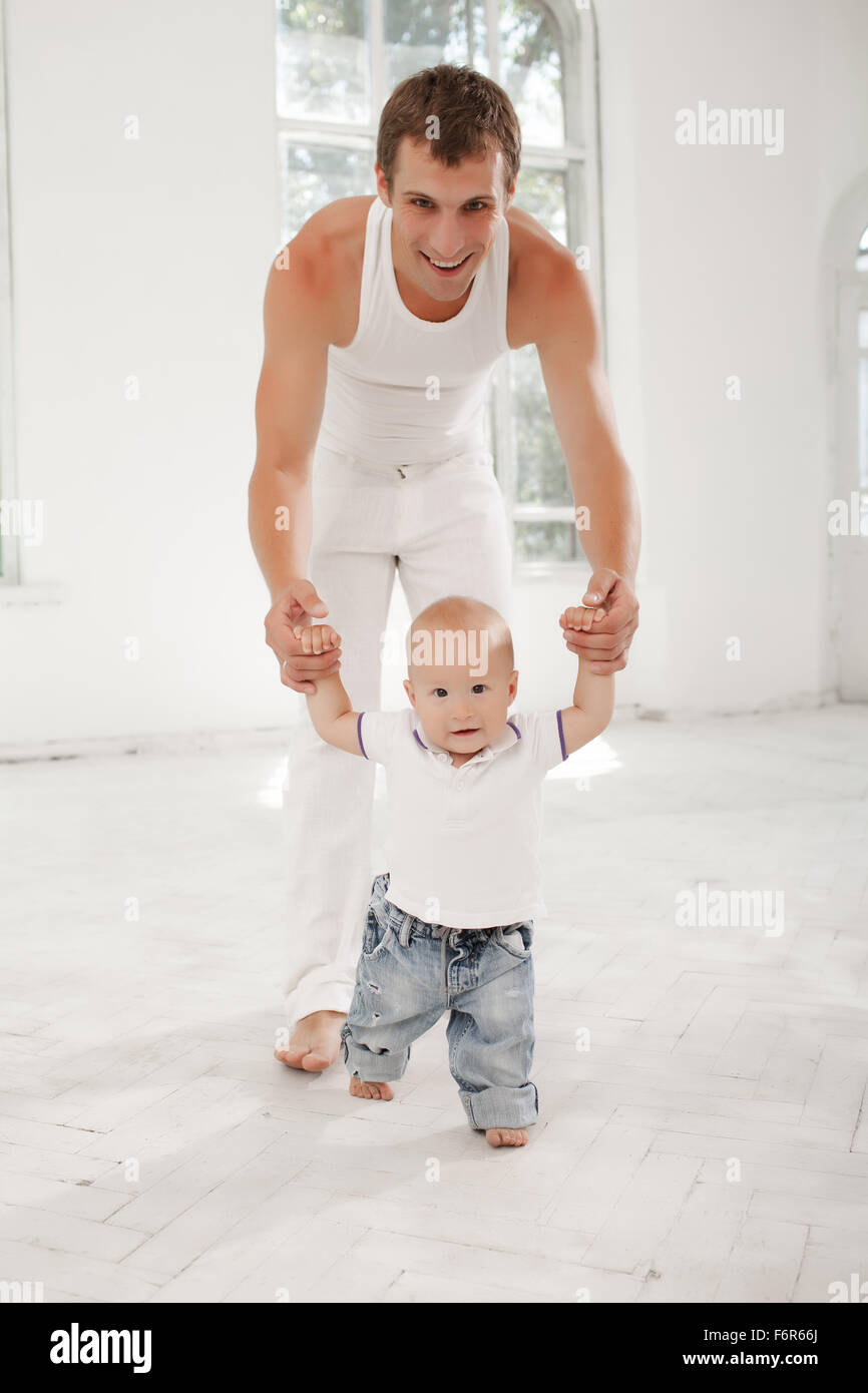 young father with his nine months old son at home Stock Photo - Alamy