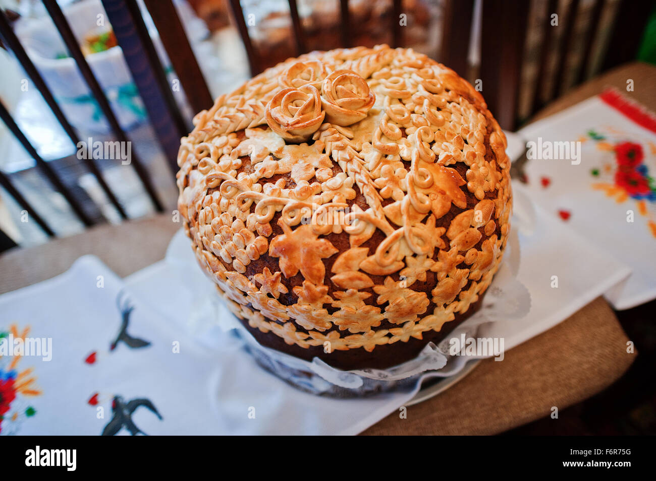 wedding loaf on chair with traditional towel Stock Photo - Alamy