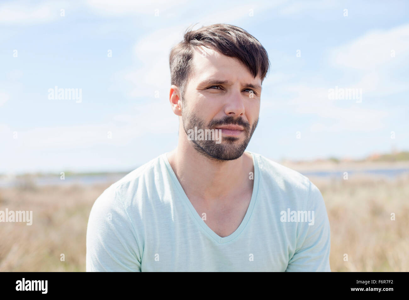 Serious man day dreaming hi-res stock photography and images - Alamy
