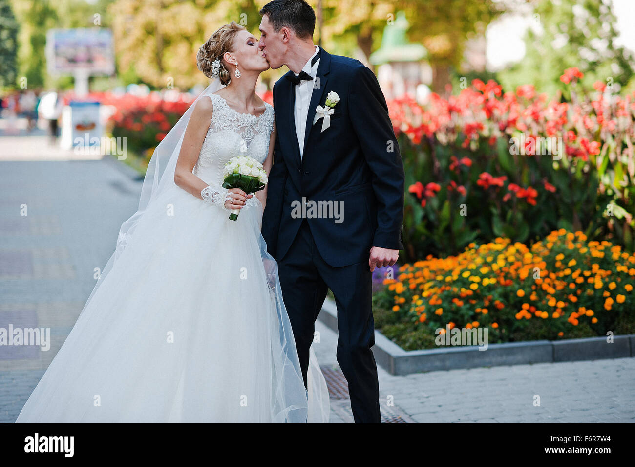 wedding couple in love on streets of evening Lviv, Ukraine Stock Photo ...