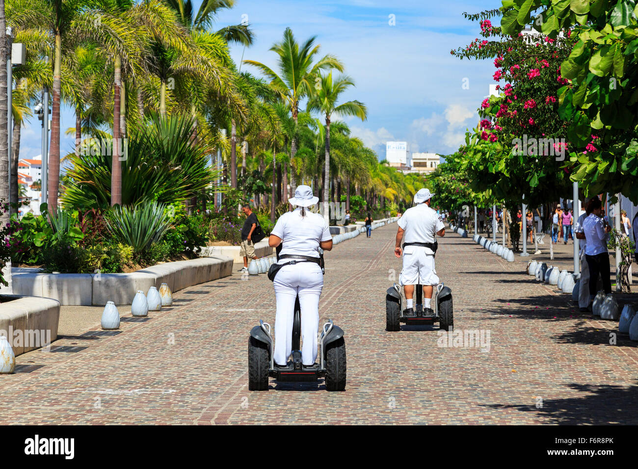 Police officers in Puerto Vallarta, Mexico on mobile patrol using ...