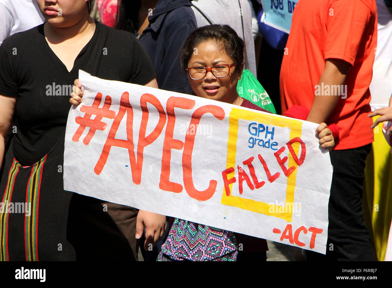 Manila, Philippines. 19th Nov, 2015. Protesters showing her grading ...