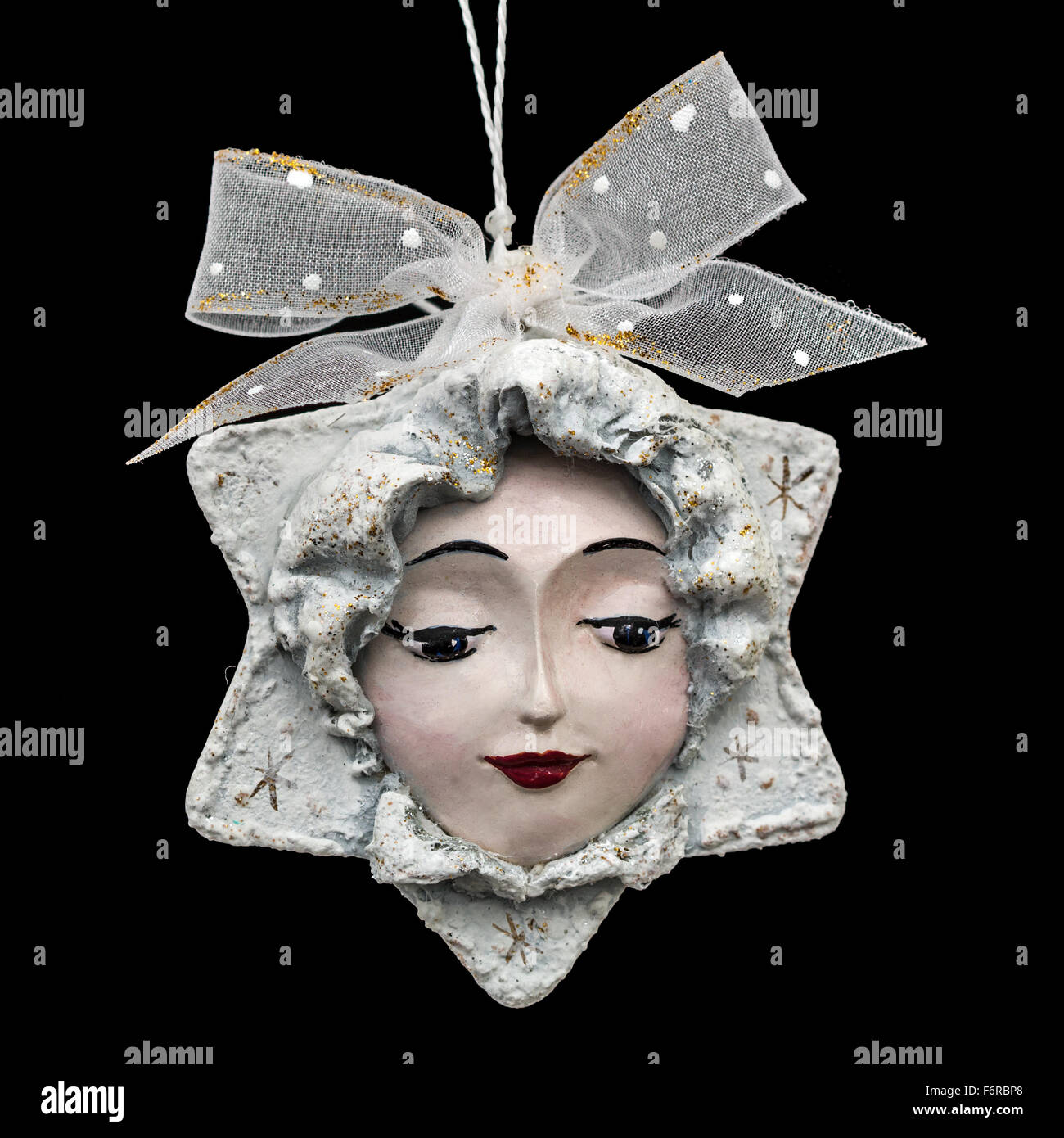 Beautiful mask of hand-worked for festive decoration, isolated on black ...