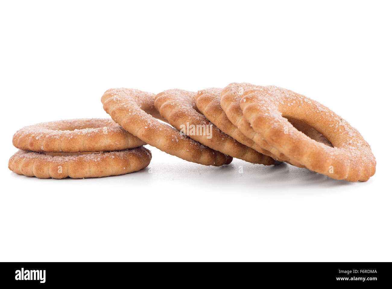 Rings biscuits pile isolated on a white background Stock Photo - Alamy