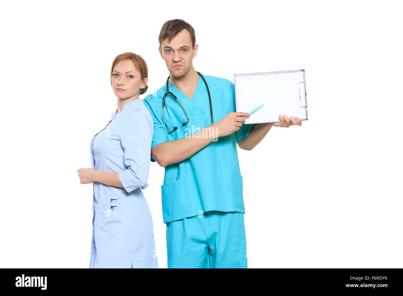 Group serious doctors presenting empty board. Isolated on white Stock ...