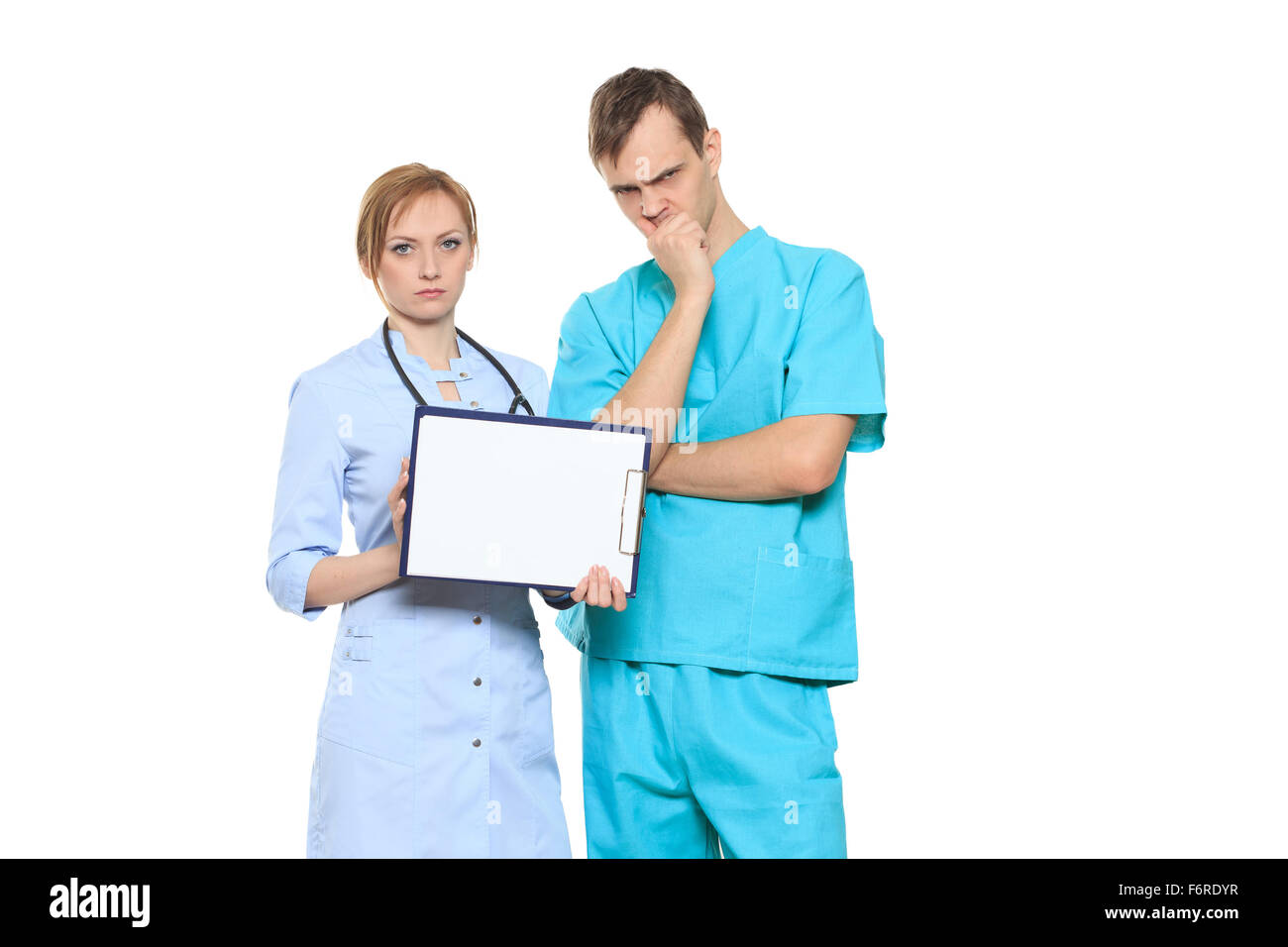 Group serious doctors presenting empty board. Isolated on white Stock ...