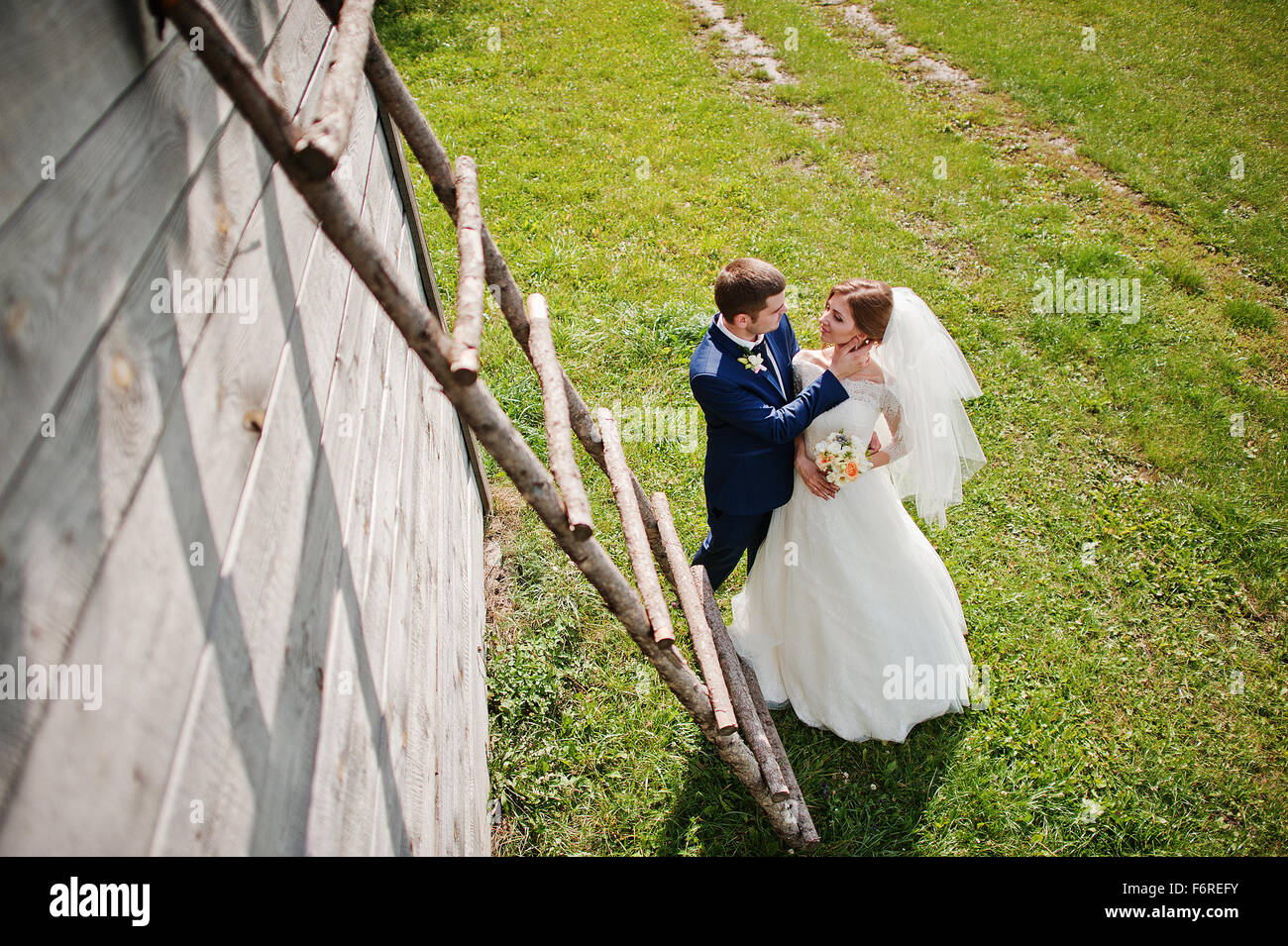 Just married background wooden ladder Stock Photo - Alamy