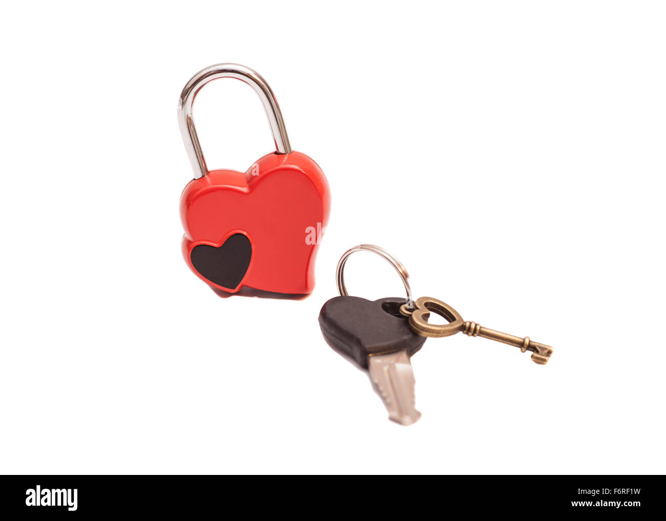 Locked shaped heart and keys isolated on white Stock Photo - Alamy