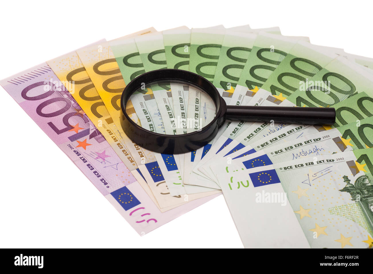 Euro banknote under magnifying glass Stock Photo - Alamy