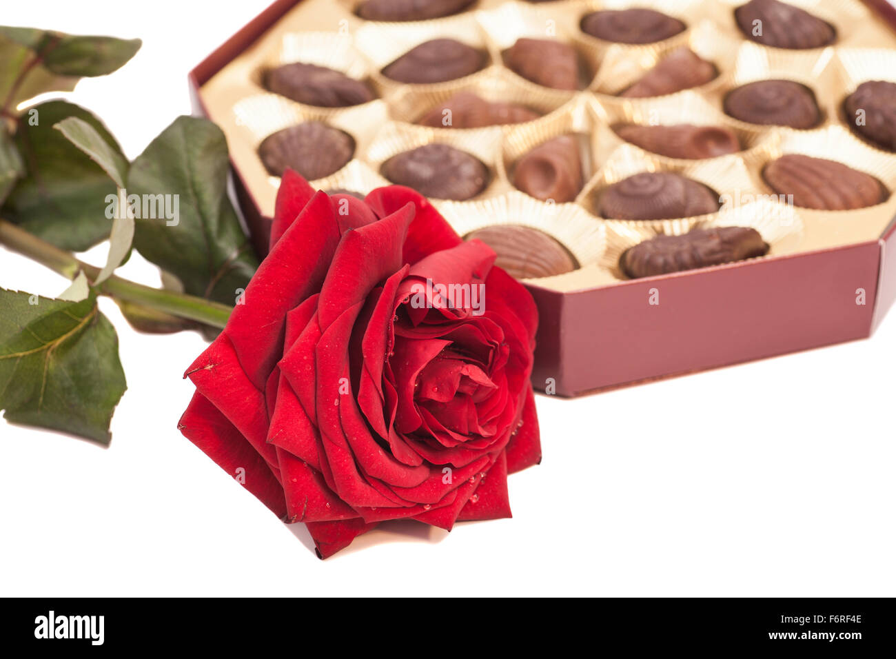 chocolate box and red rose Stock Photo - Alamy