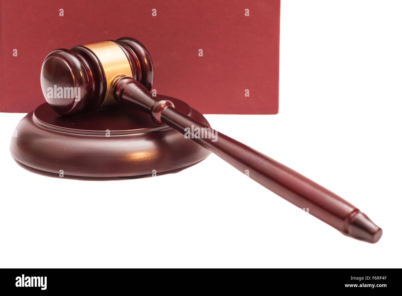 Gavel and book on white background Stock Photo - Alamy