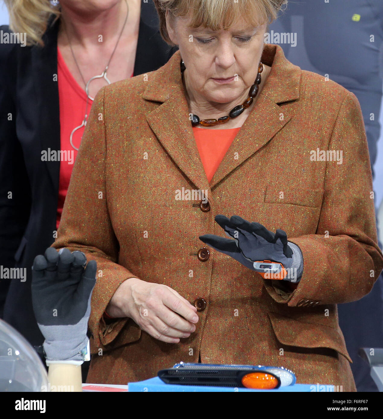 Berlin, Germany. 19th Nov, 2015. German Chancellor Angela Merkel tests ...