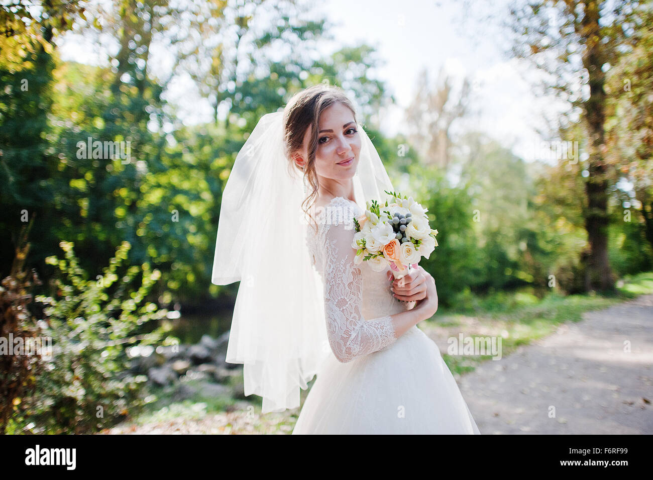 portrait of bride with bouquet Stock Photo - Alamy