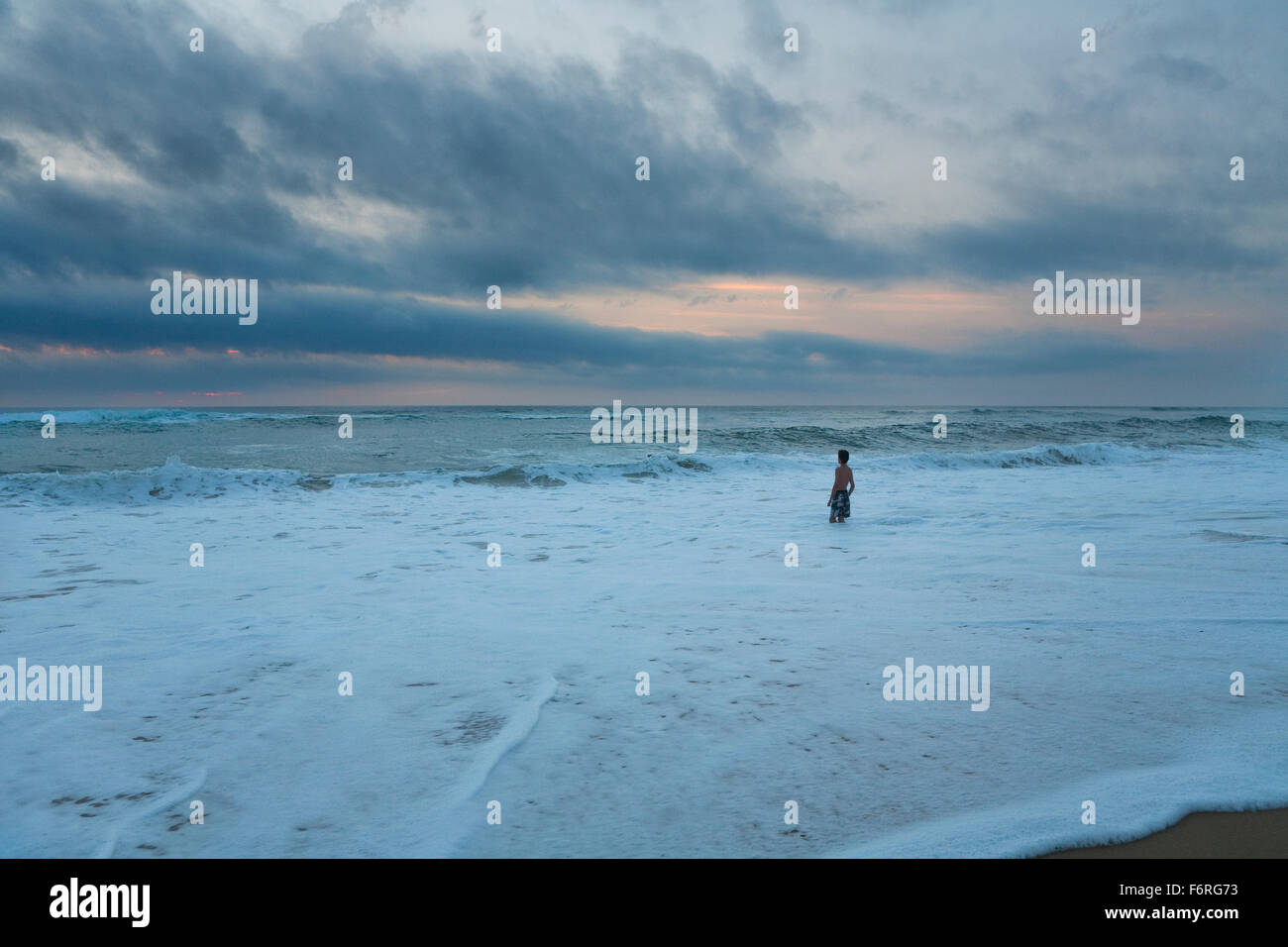 Sunset Swimming. A Lone swimmer heads off into the great big space of ...