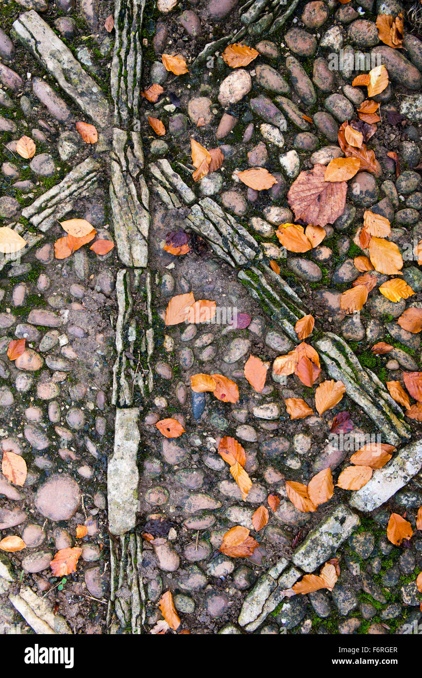 Old Cobbled path at Minster Lovell Hall ruins in autumn. Oxfordshire ...