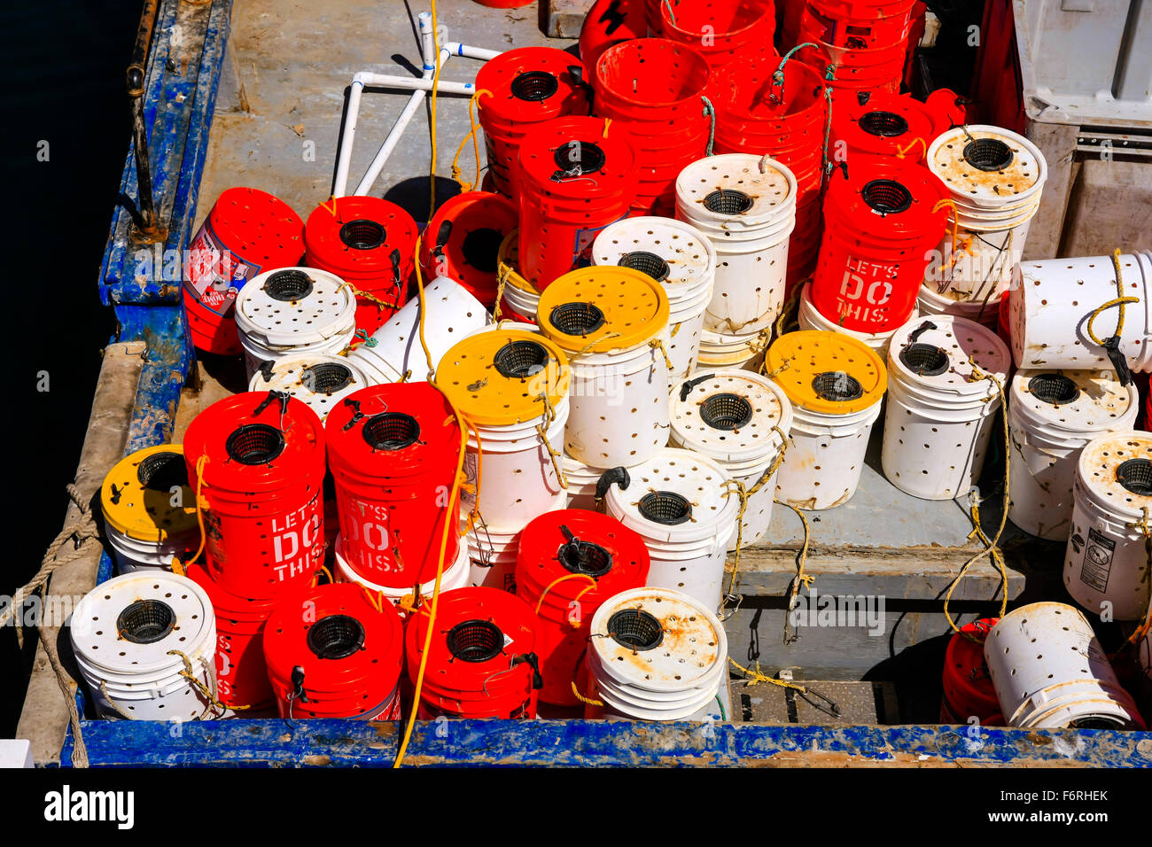 Large plastic buckets on the back of a fishing boat turned into crab ...