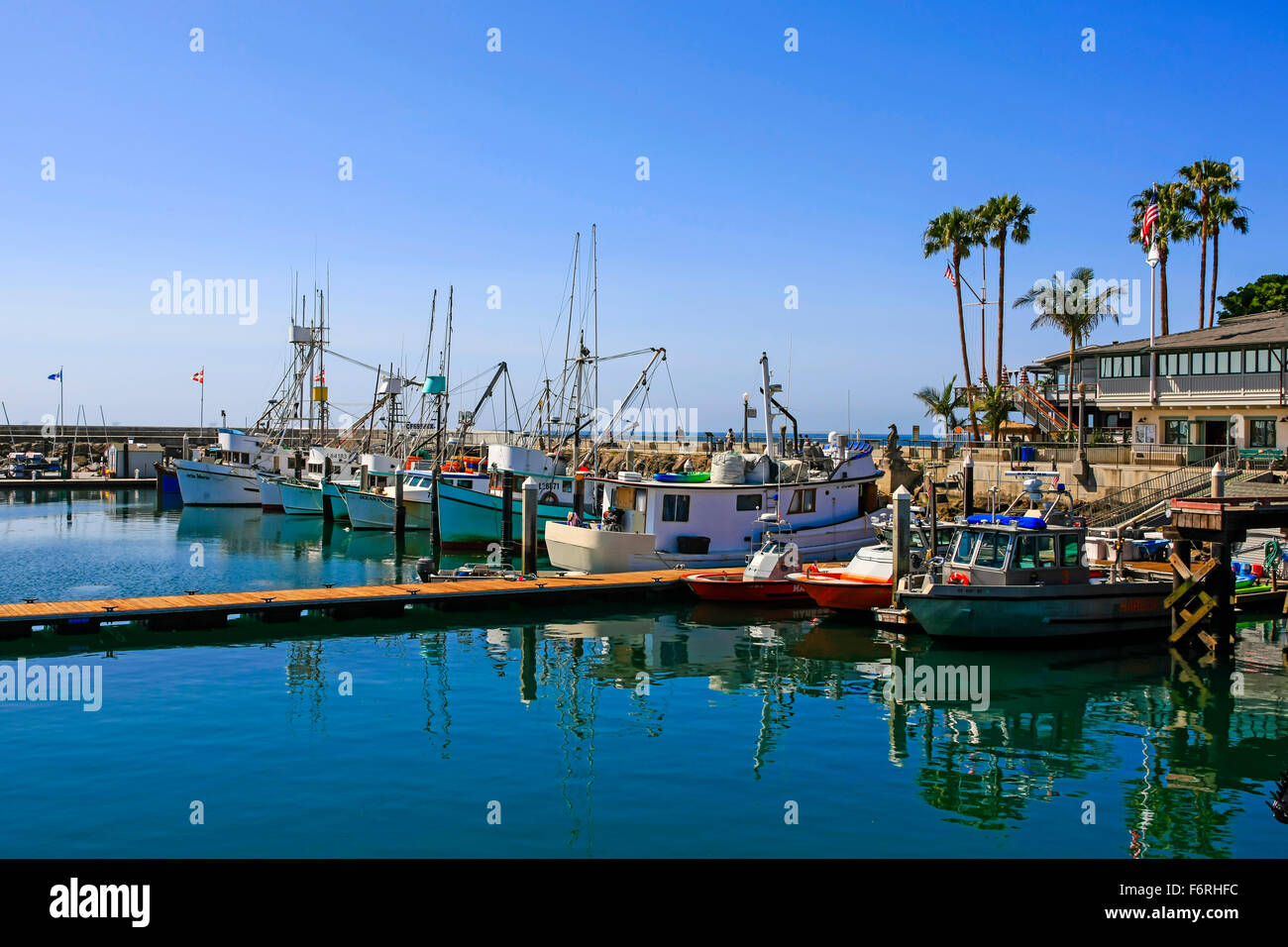 Fishing boats and pleasure craft all tied up in the Santa Barbara ...