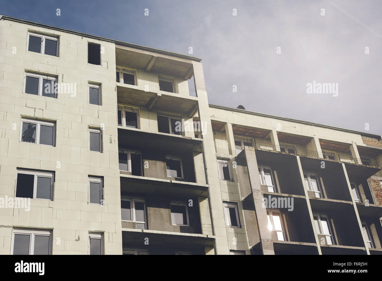 Unfinished generic residential building, construction site with no ...