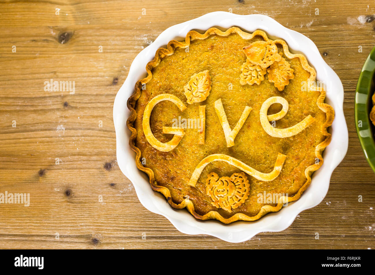 Homemade pumpkin pies with Give Thanks sign and Autumn stamped leafs ...