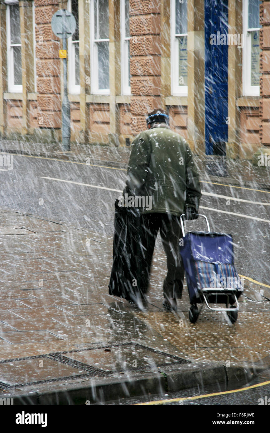 Man pulling trolley hi-res stock photography and images - Alamy