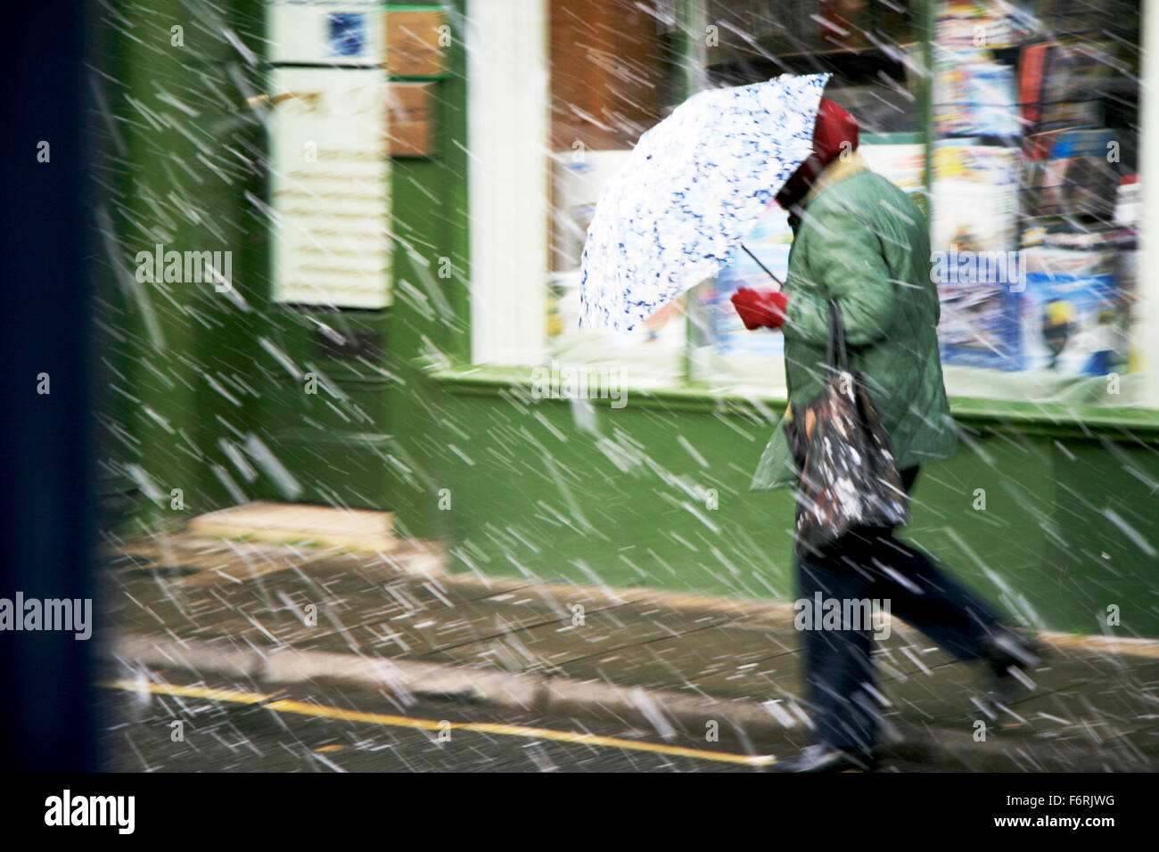 Walking in wind blowing snow hi-res stock photography and images - Alamy