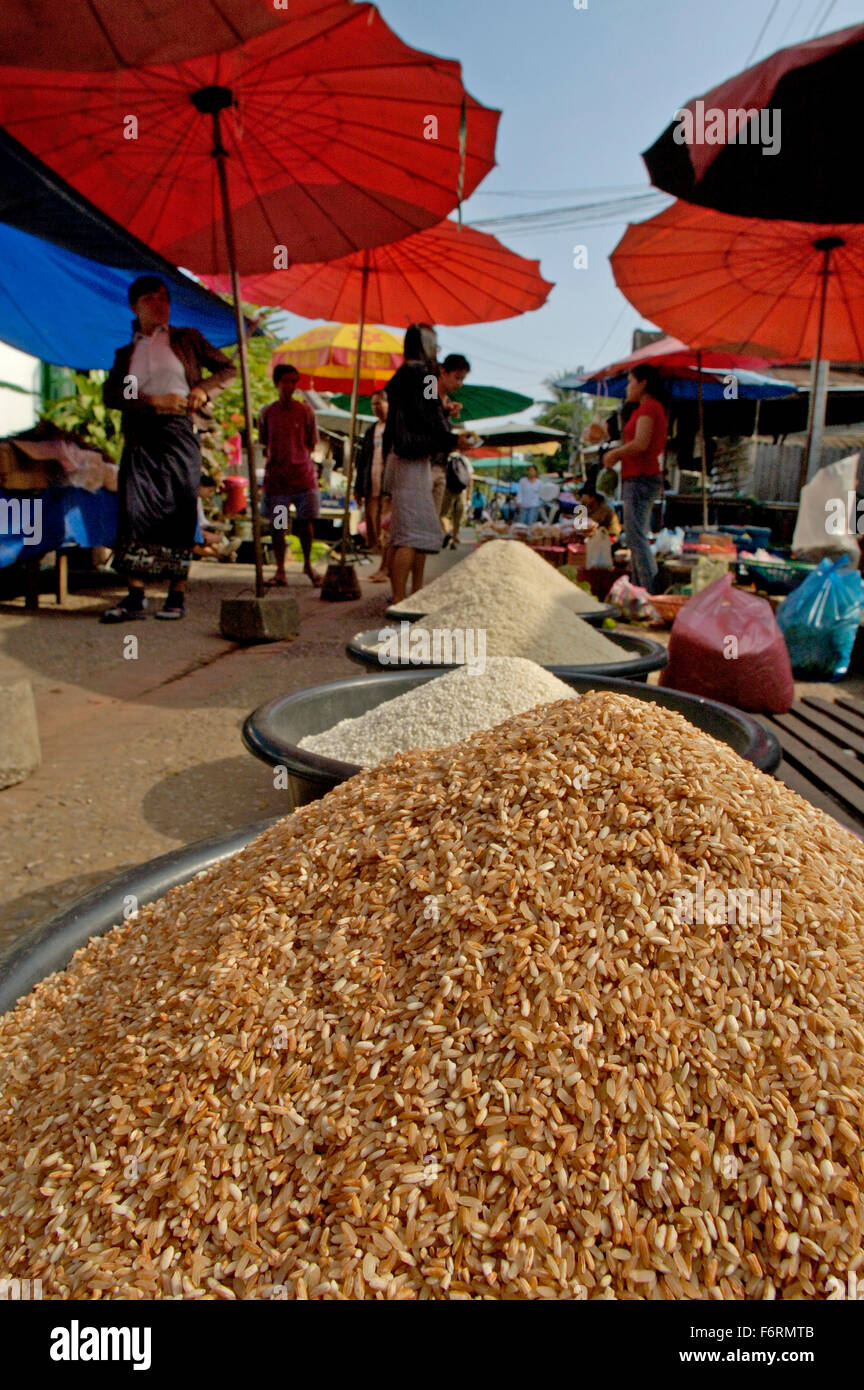 Laos local market rice umbrella hi-res stock photography and images - Alamy