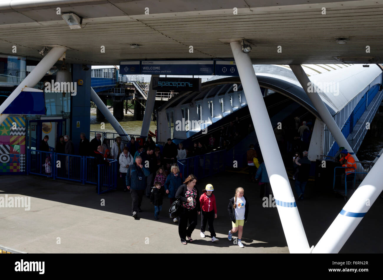 Passengers about to board the ferry at the Seacombe Mersey ferry ...