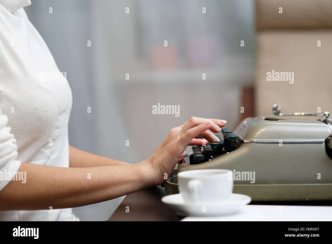 Hands writing on typewriter Stock Photo - Alamy