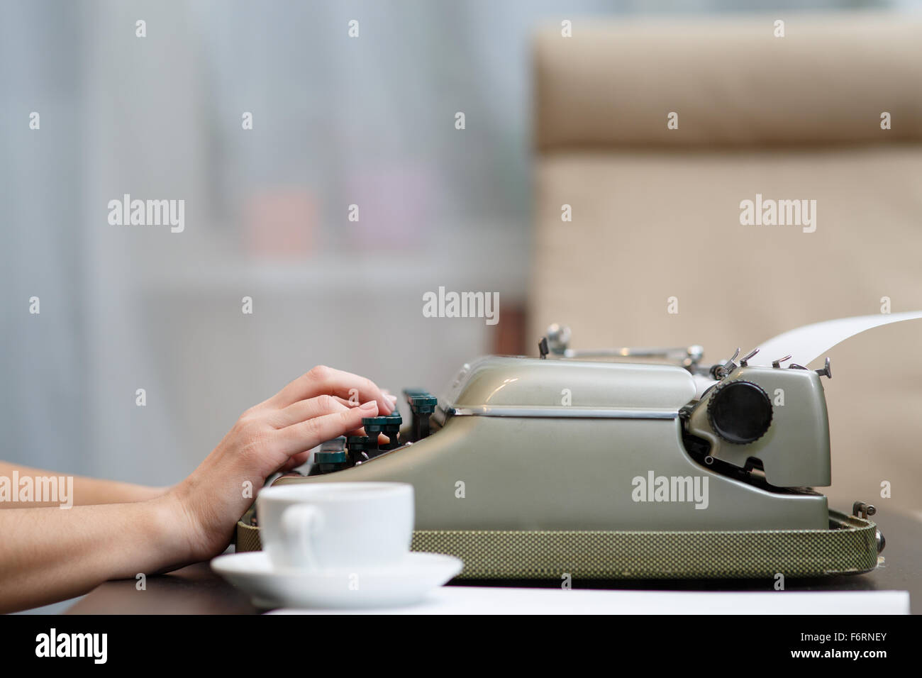 Hands writing on typewriter Stock Photo - Alamy