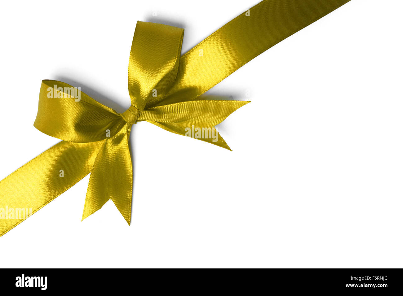 Shiny yellow satin ribbon on white background Stock Photo - Alamy