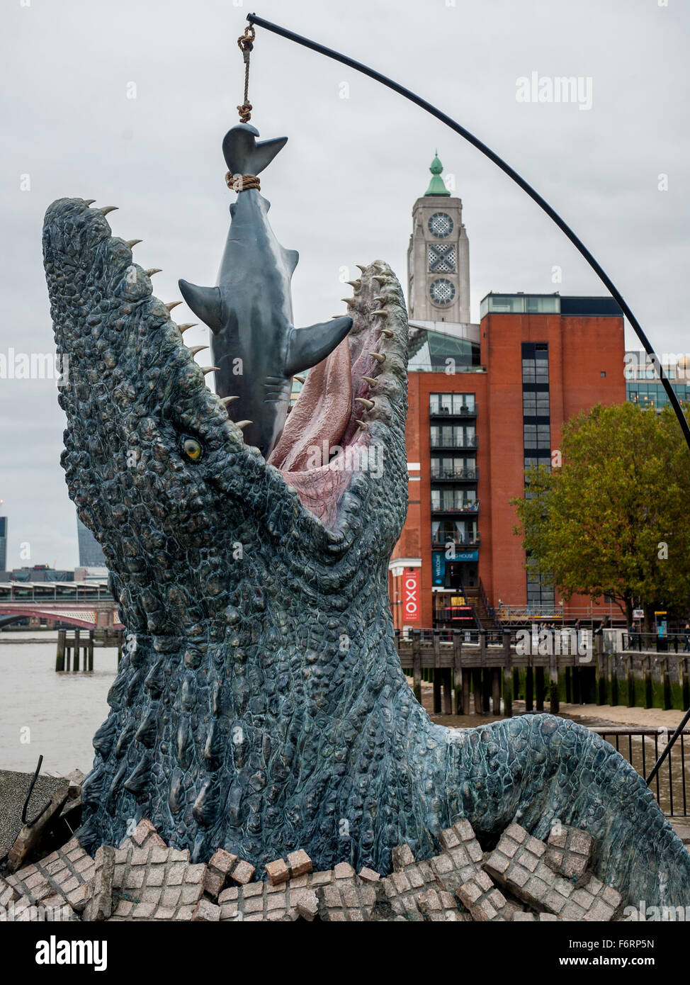 A giant Mosasaurus dinosaur eating a Great White shark was unveiled at ...