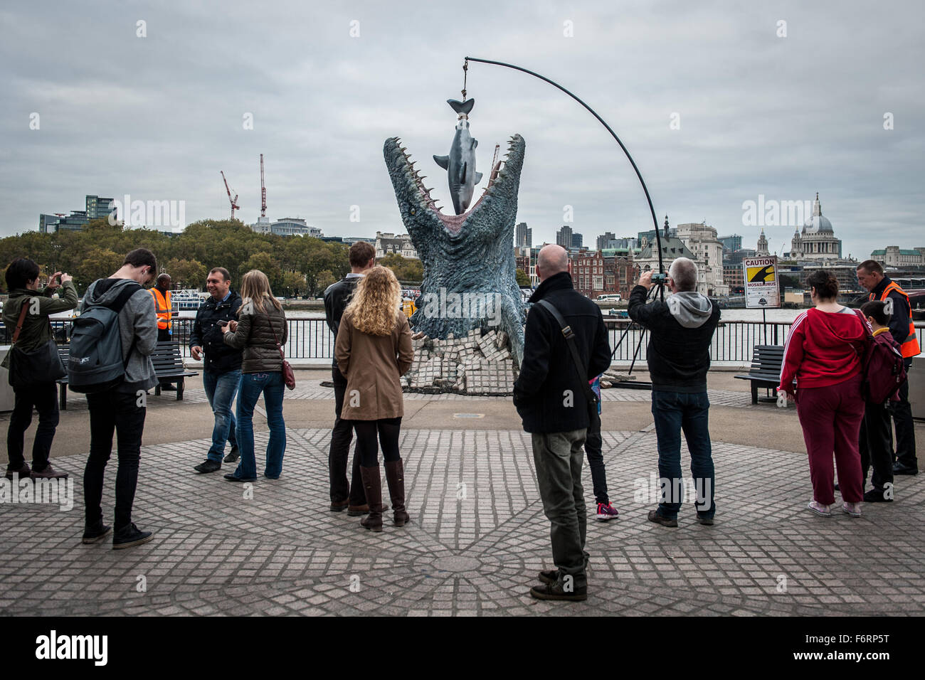 A giant Mosasaurus dinosaur eating a Great White shark was unveiled at ...