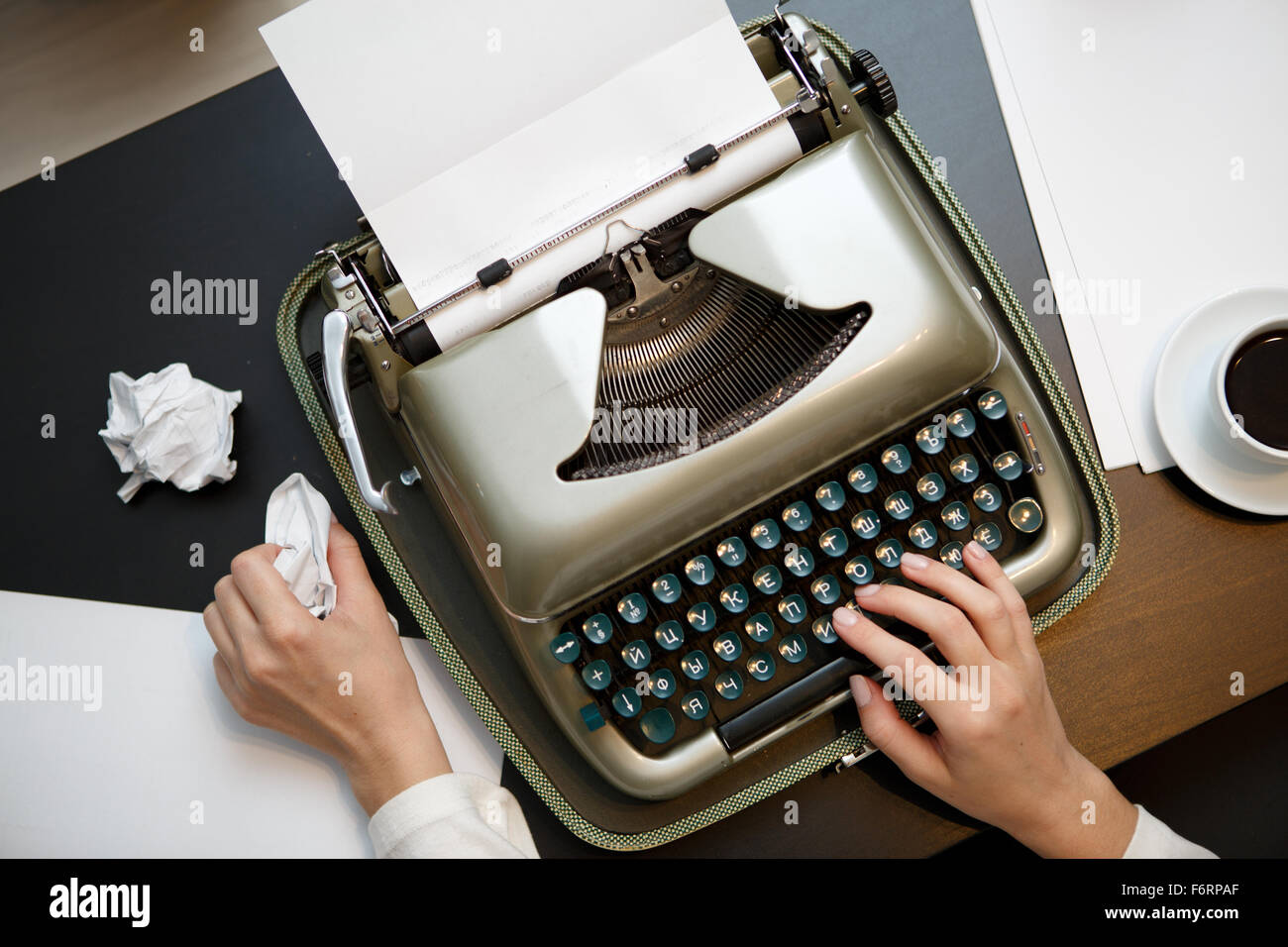 Vintage typewriter and blank sheet of paper, human hands Stock Photo ...