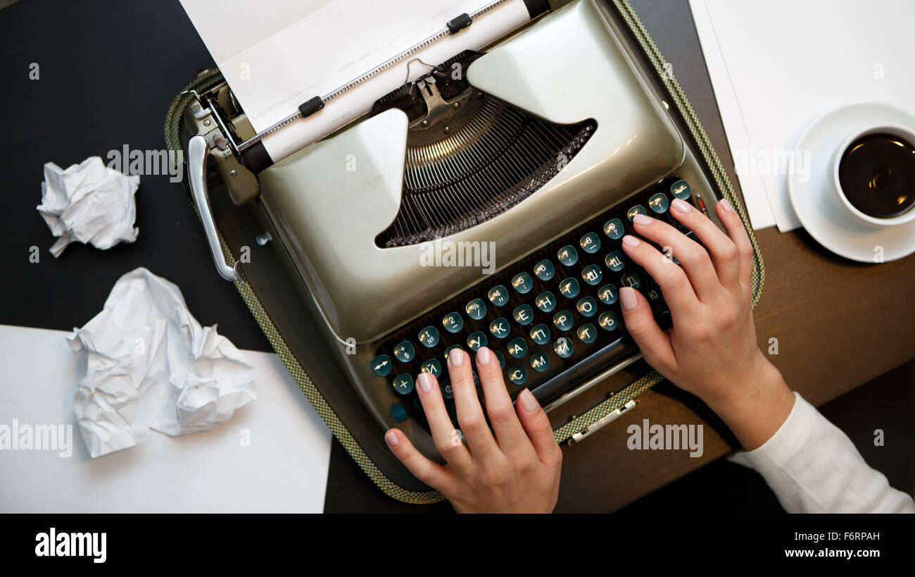 Vintage typewriter and blank sheet of paper, human hands Stock Photo ...