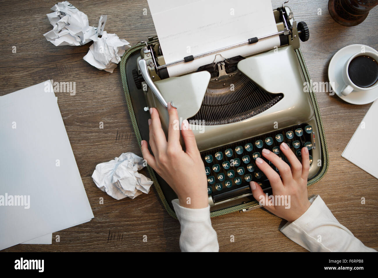 Vintage typewriter and blank sheet of paper, human hands Stock Photo ...