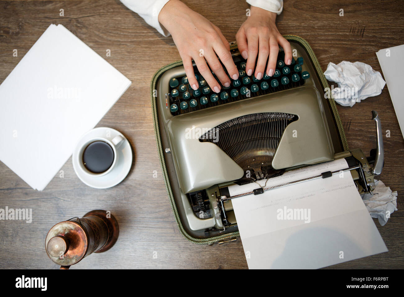 Hands on typing machine Stock Photo - Alamy