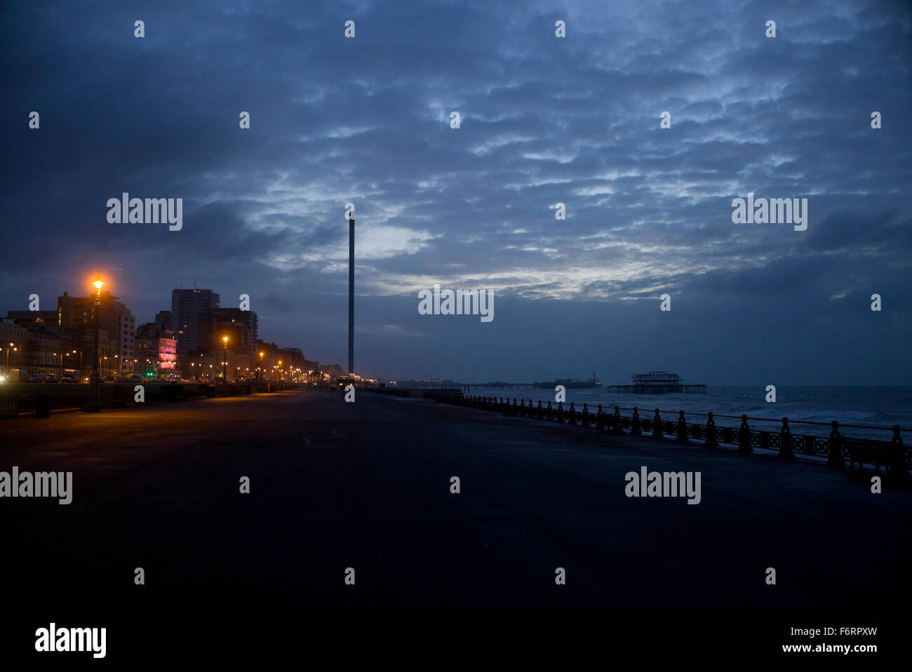 Brighton seafront before dawn, lights, stormy sky, i360 viewing tower ...