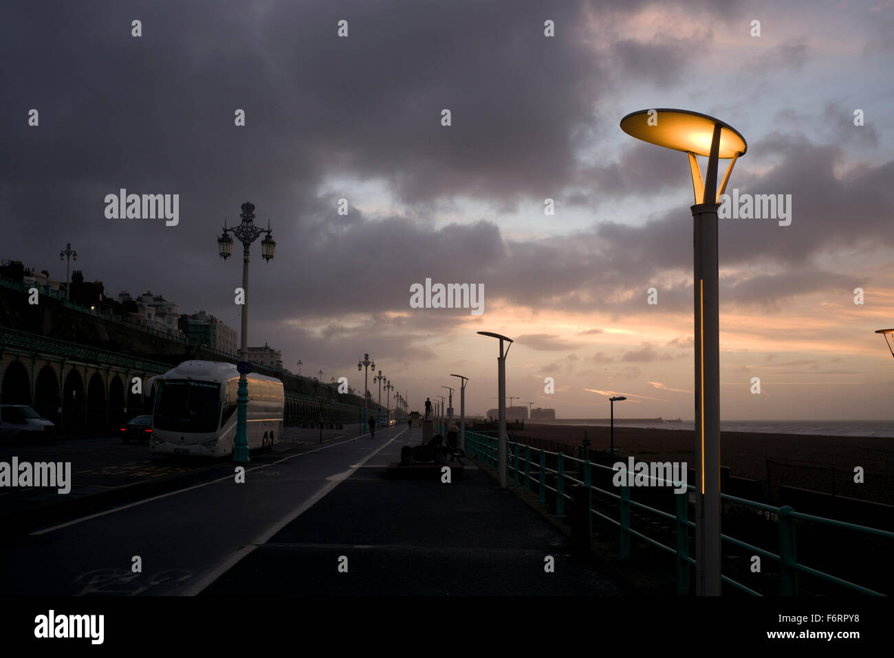 Empty promenade at dawn, streetlights, Brighton, UK Stock Photo - Alamy