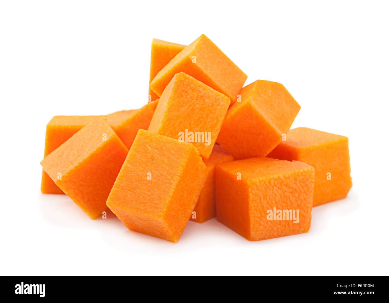 Pumpkin vegetable cube slice isolated on white Stock Photo - Alamy