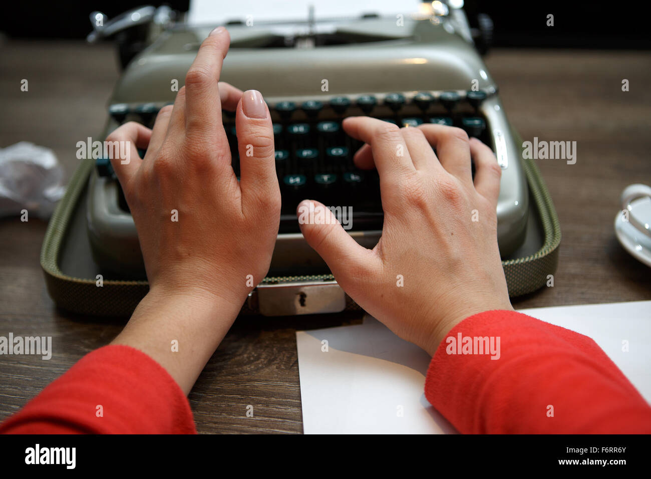 woman typing on old typewriter Stock Photo - Alamy