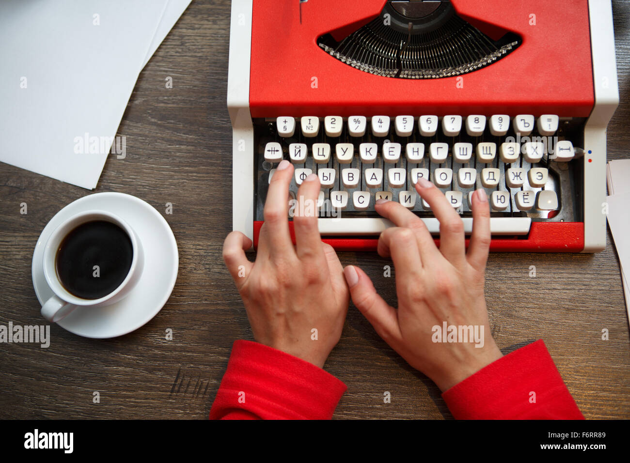 closeup hands on typing machine on desk Stock Photo - Alamy