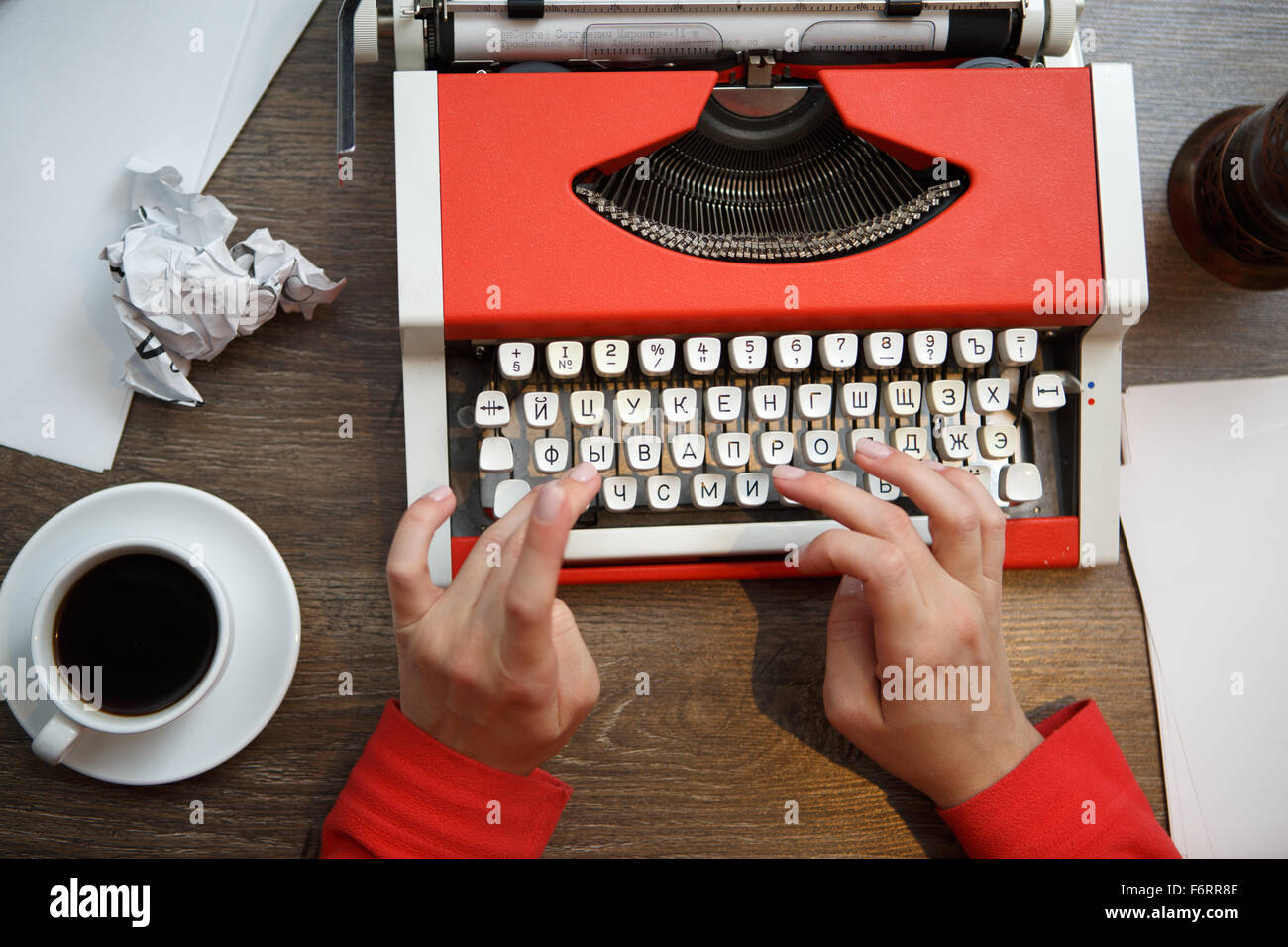 Hands on typing machine Stock Photo - Alamy