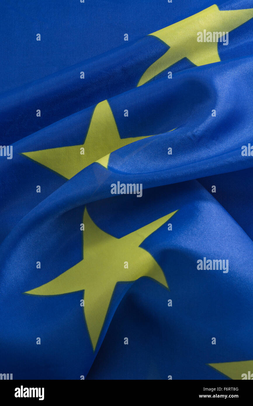 Ruffled yellow stars of the EU / European Union flag symbolizing ...