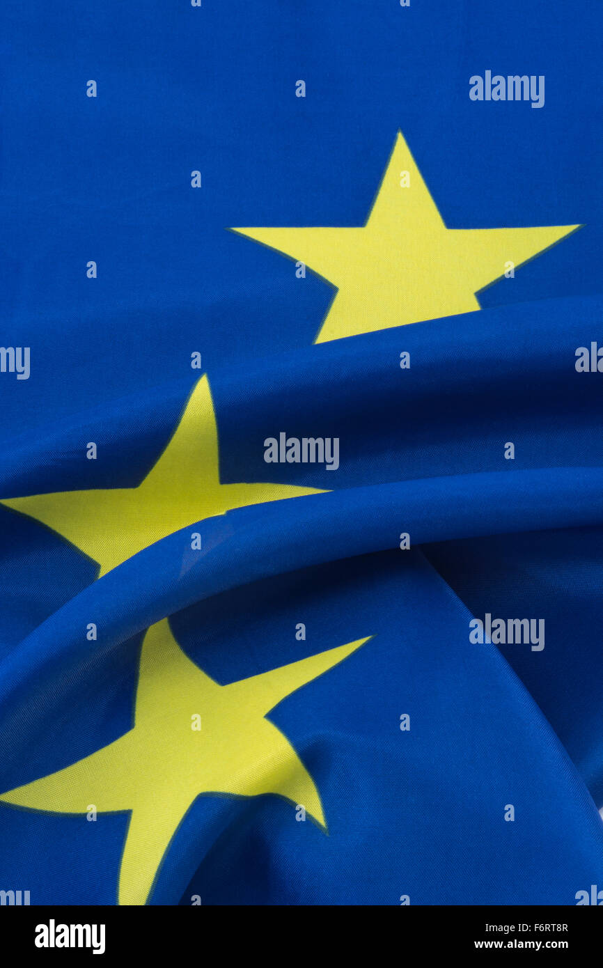 Ruffled yellow stars of the EU / European Union flag symbolizing ...