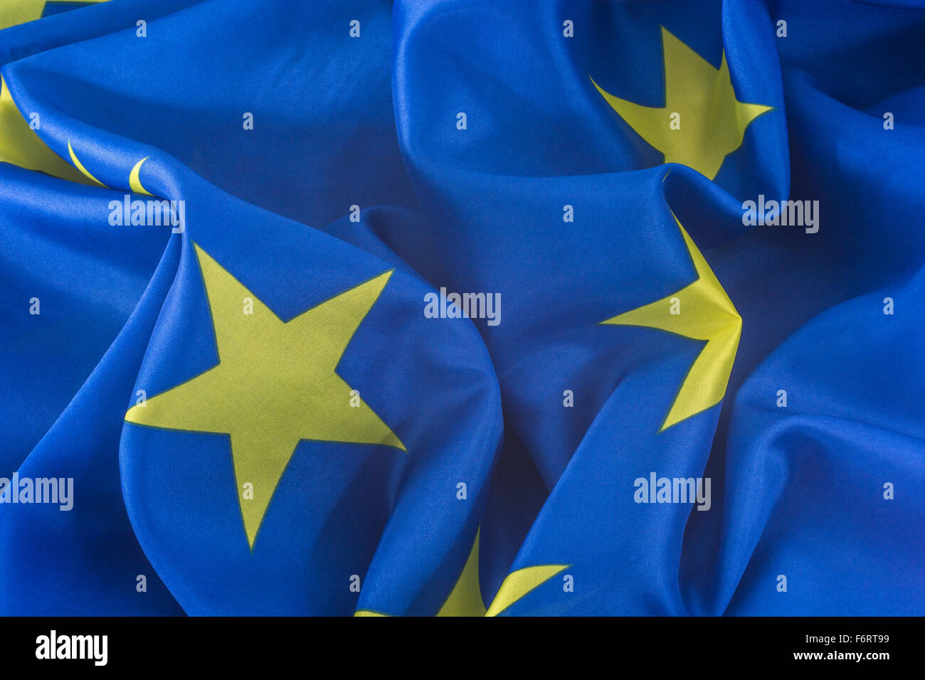Ruffled yellow stars of the EU / European Union flag symbolizing ...