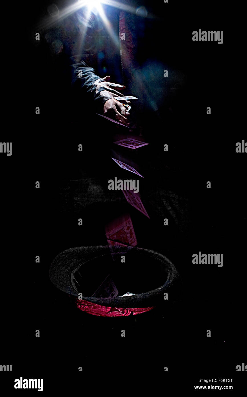 Throwing cards into hat hi-res stock photography and images - Alamy