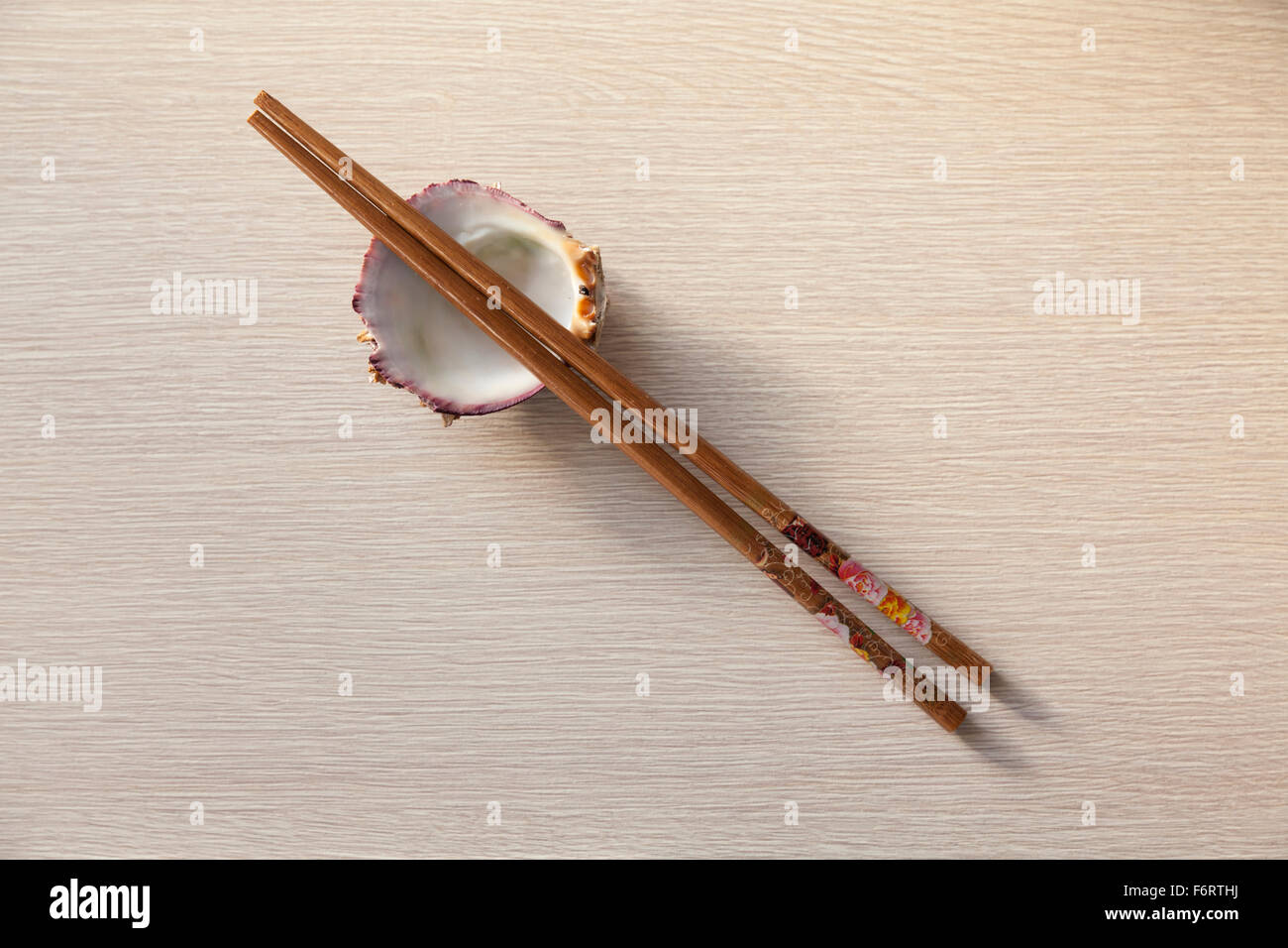 group of Chinese chopsticks on wooden table Stock Photo - Alamy